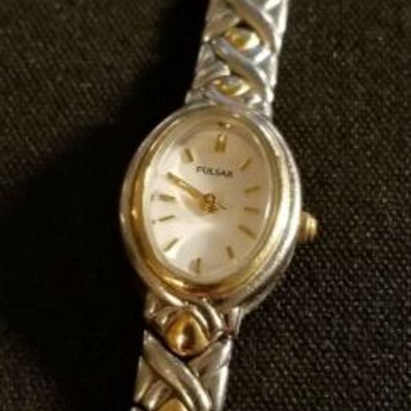 Ladies Pulsar by Seiko Watch Silver-Gold Tone V811- X043 Quartz | WatchCharts Marketplace