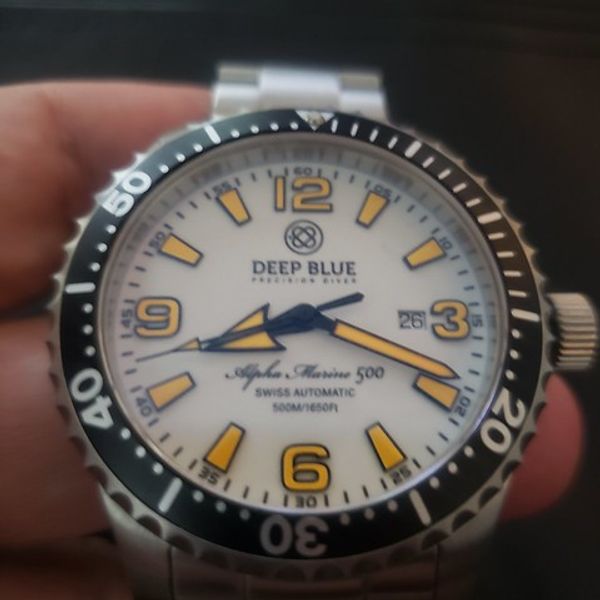 fs: Deep Blue Alpha Marine Black Lume Dial Swiss Automatic | WatchCharts