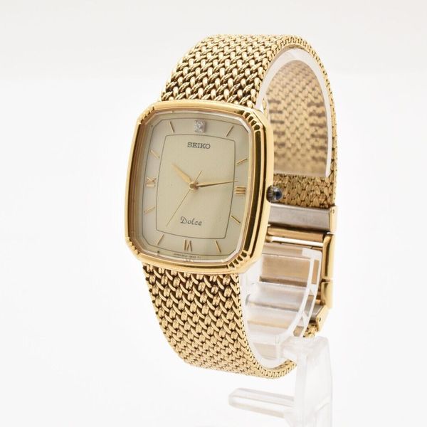 reserved Vintage SEIKO Dolce 5E31-5A90 Diamond Gold Dial Quartz Men's JAPAN | WatchCharts ...