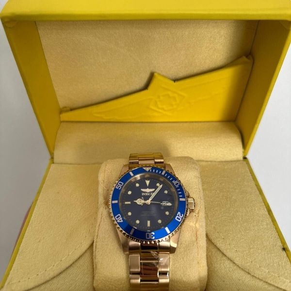 Gold with blue face Invicta Watch | WatchCharts Marketplace