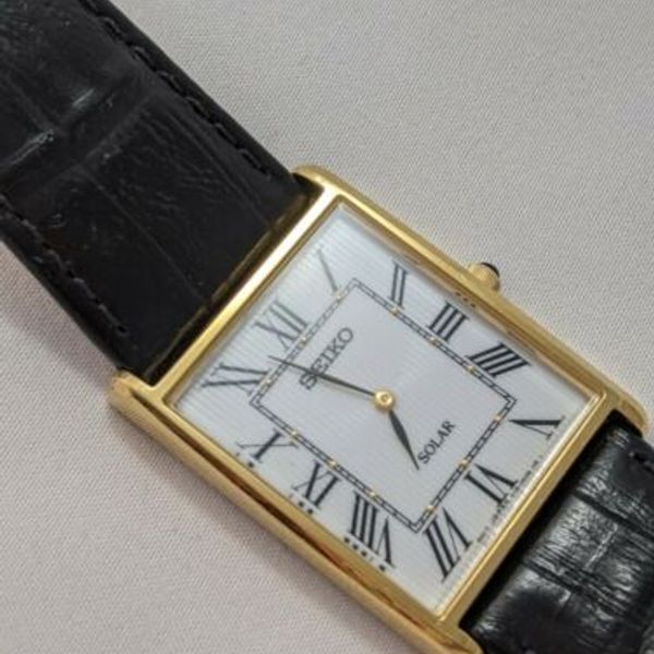 Seiko Men's Solar Dress Watch White Face Black Alligator Leather Band V115-0BC0 | WatchCharts ...