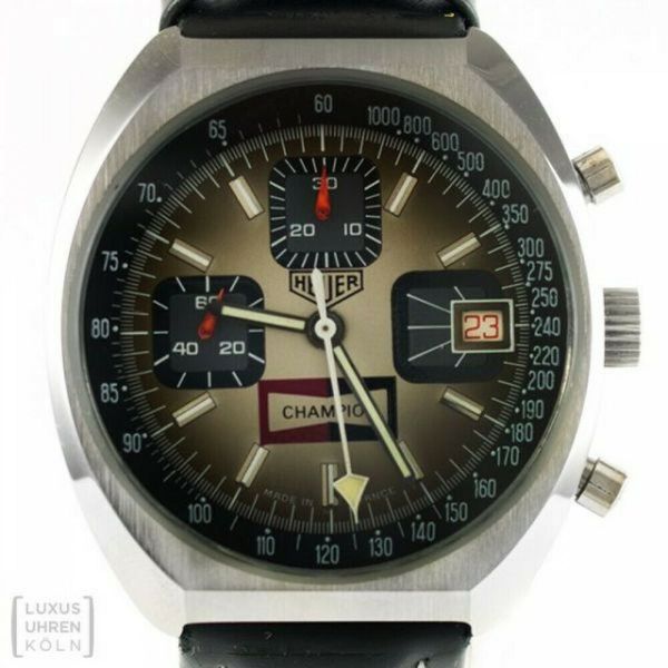 Heuer Spark Plug Champion Chronograph Ref. 1614 Revision 1975 | WatchCharts
