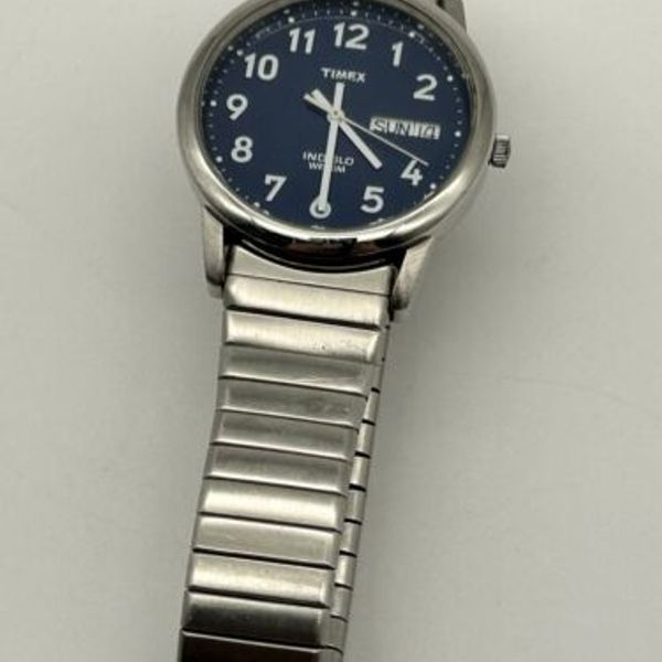 Timex Indiglo WR30M navy blue face date analog stretch menâ s watch needs battery | WatchCharts ...