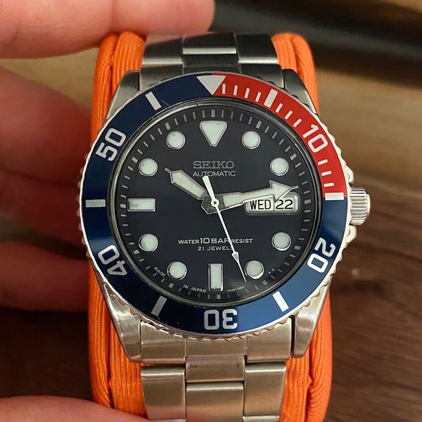 Seiko SKX033J | WatchCharts