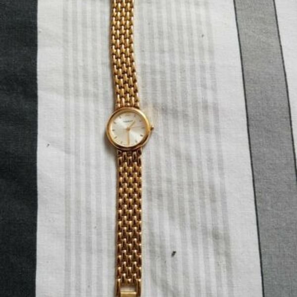Tissot 329.S825 Gold Plated Round Quartz Ladies Dress Watch with New ...