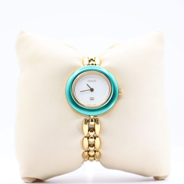 Gucci Yellow Gold Vintage Interchangable Gold Bezel Watch | WatchCharts ...