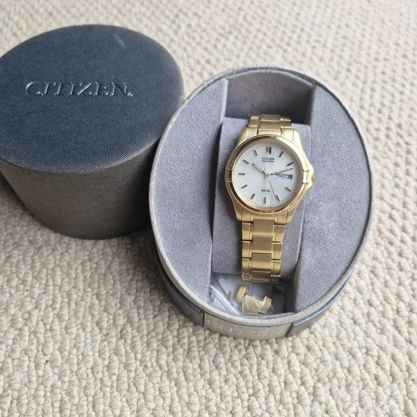CITIZEN Eco-Drive WR50 Gold Stainless Steel Unisex Watch OST ...