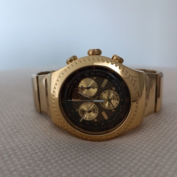 Swatch Swiss Irony Gold V8 James Bond 007 - Oddjob/Goldfinger (Limited edition) | WatchCharts ...