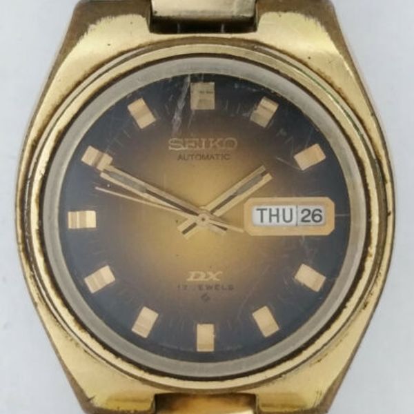 Vintage 1970s Seiko DX Automatic 6106-7619 Day Date Sunburst Dial Mens Watch | WatchCharts