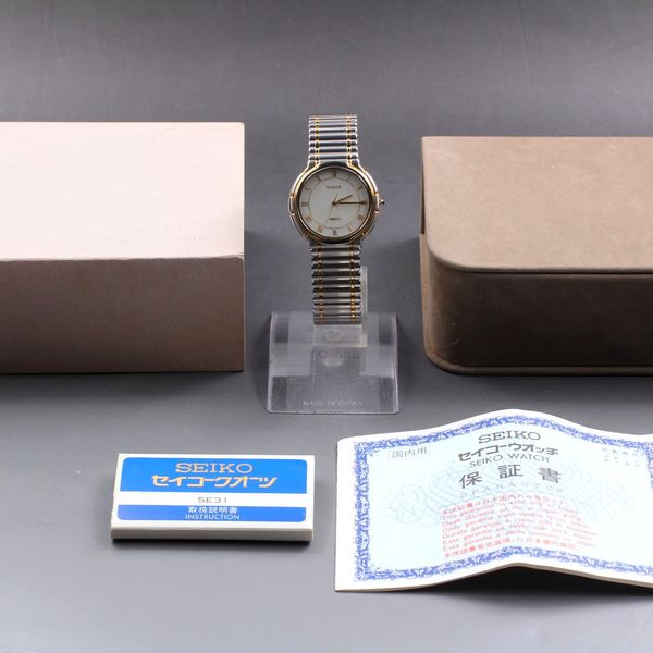 [Near MINT w/Box Paper] Vintage SEIKO Dolce 5E31-6B20 33mm Roman Qz Men's Watch | WatchCharts ...
