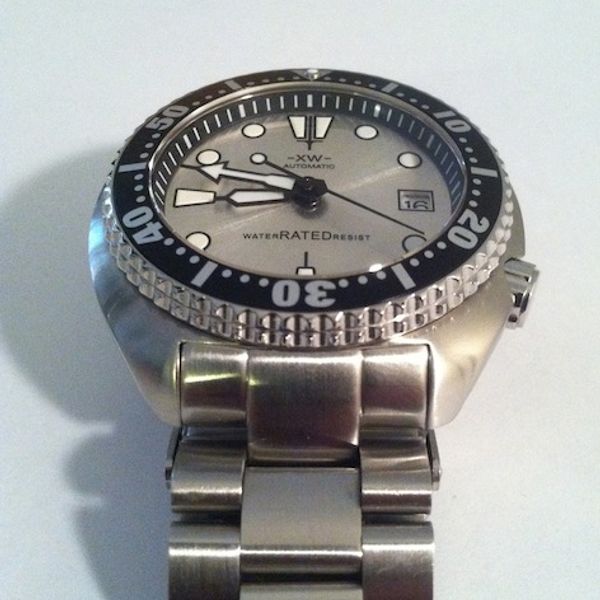 SOLD - Silver Tsunami Classic Sunburst - Beautiful! | WatchCharts ...