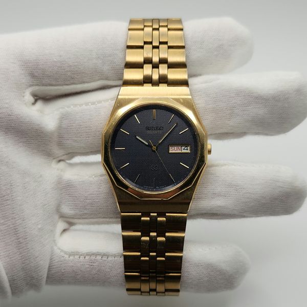 Seiko SQ Men's Vintage Day/Date Gold Tone Quartz Watch 5Y23-6A39 | WatchCharts Marketplace