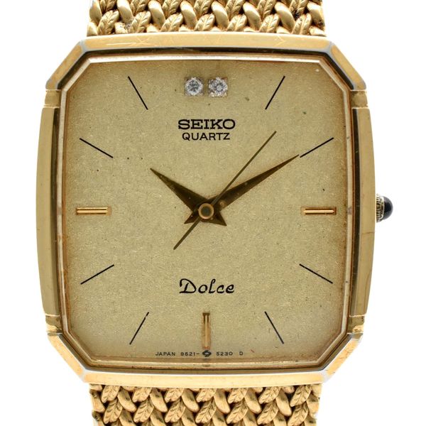 Vintage 1985 [EXC+5] SEIKO Dolce 9521-5210 Gold 2P Diamond Qz Men's Watch JAPAN | WatchCharts ...