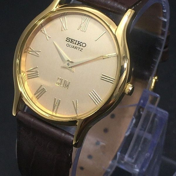 Seiko Slim Quartz Japanese ROMAN NUMERALS GOLD FACE BROWN BAND Men's ...