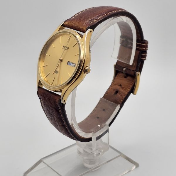 Vintage 1989 Seiko Quartz SQ Day Date Gold Tone WR Mens Watch 5Y23-7079 Sunburst | WatchCharts ...