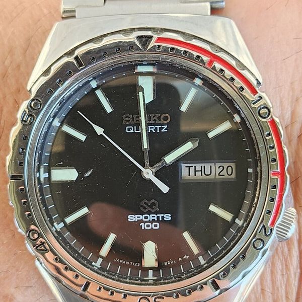 Seiko SQ 7123-8219 Sports 100 Black Dial Feb 1982 | WatchCharts