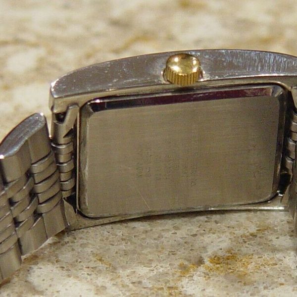 CITIZEN MEN'S QUARTZ SILVER CASE BLACK DIAL RETANGULAR 28MM WATCH ...