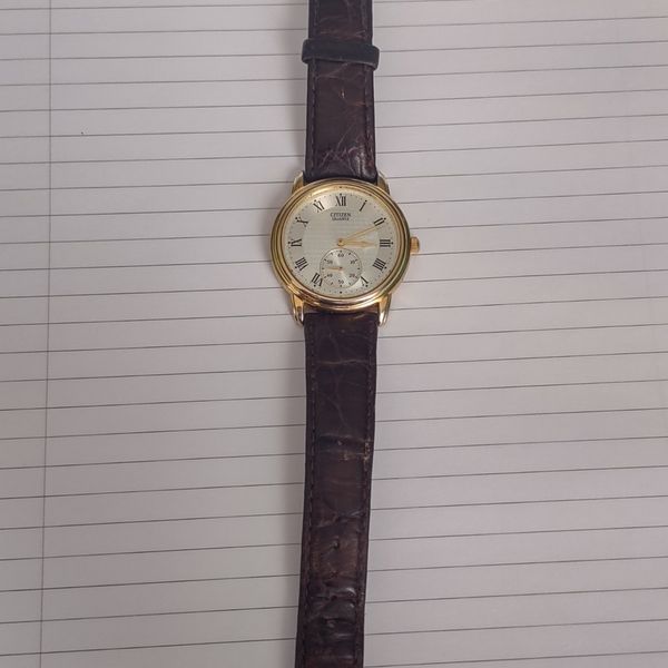 Citizen Quartz Gold Tone Roman Numerals Leather Strap Timepiece. Sub ...
