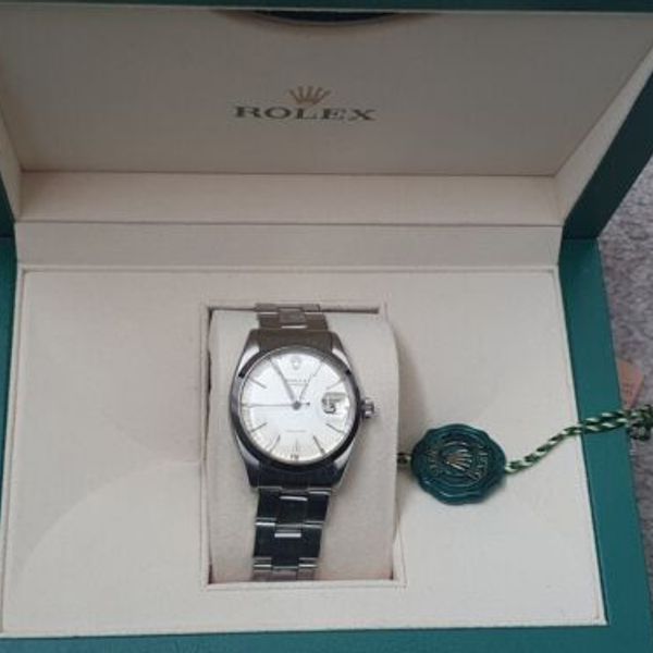 A FINE GENTS ROLEX OYSTERDATE. SILVER DIAL PRECISION MODEL 6694 ...