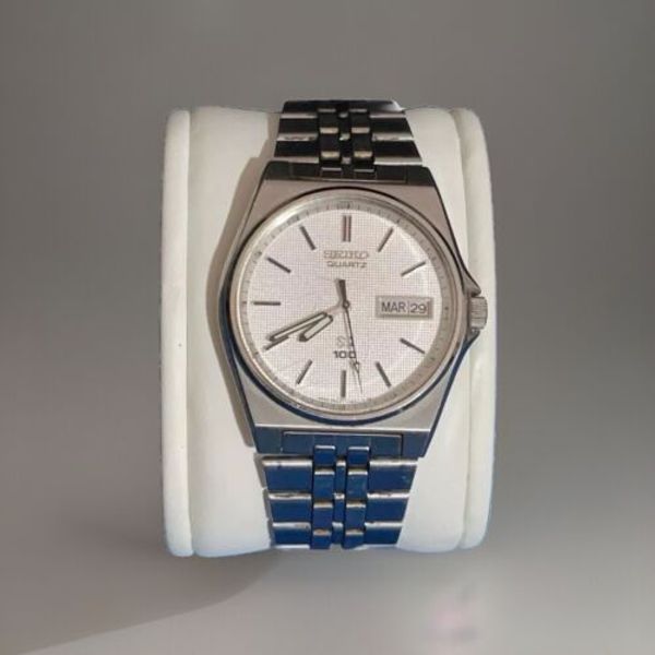 Vintage Silver Seiko SQ100 34 MM | WatchCharts Marketplace