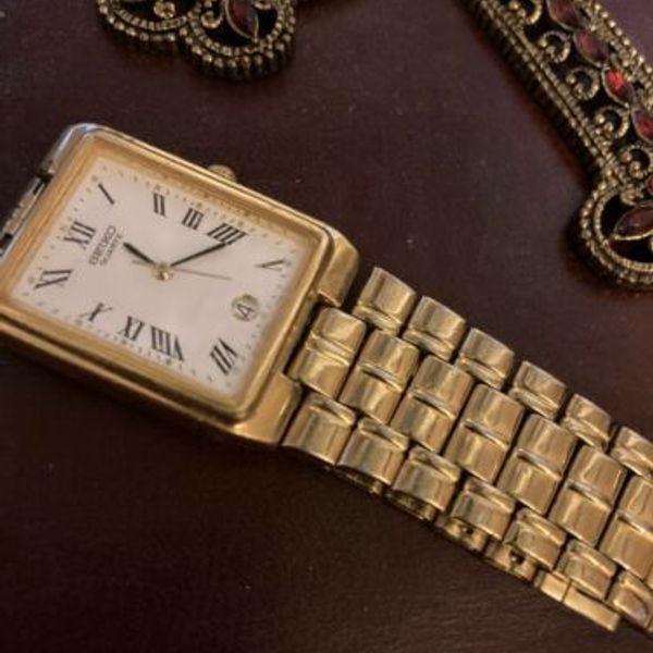 Vintage Seiko V722-5A50 Gold Tone Gold Dial Mens Quartz Analog Watch w/ Date | WatchCharts ...