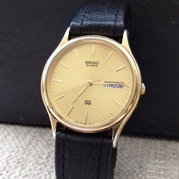 Seiko SQ Day Date Vintage mens Wristwatch | WatchCharts Marketplace