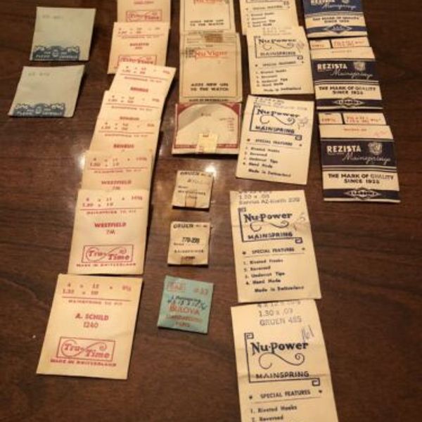LOT - 22 NOS WRIST / POCKET WATCH MAINSPRINGS BULOVA, BENRUS, GRUEN ...