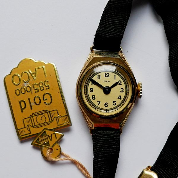 LACO 585 watch in yellow gold case NOS mint condition women's set ...